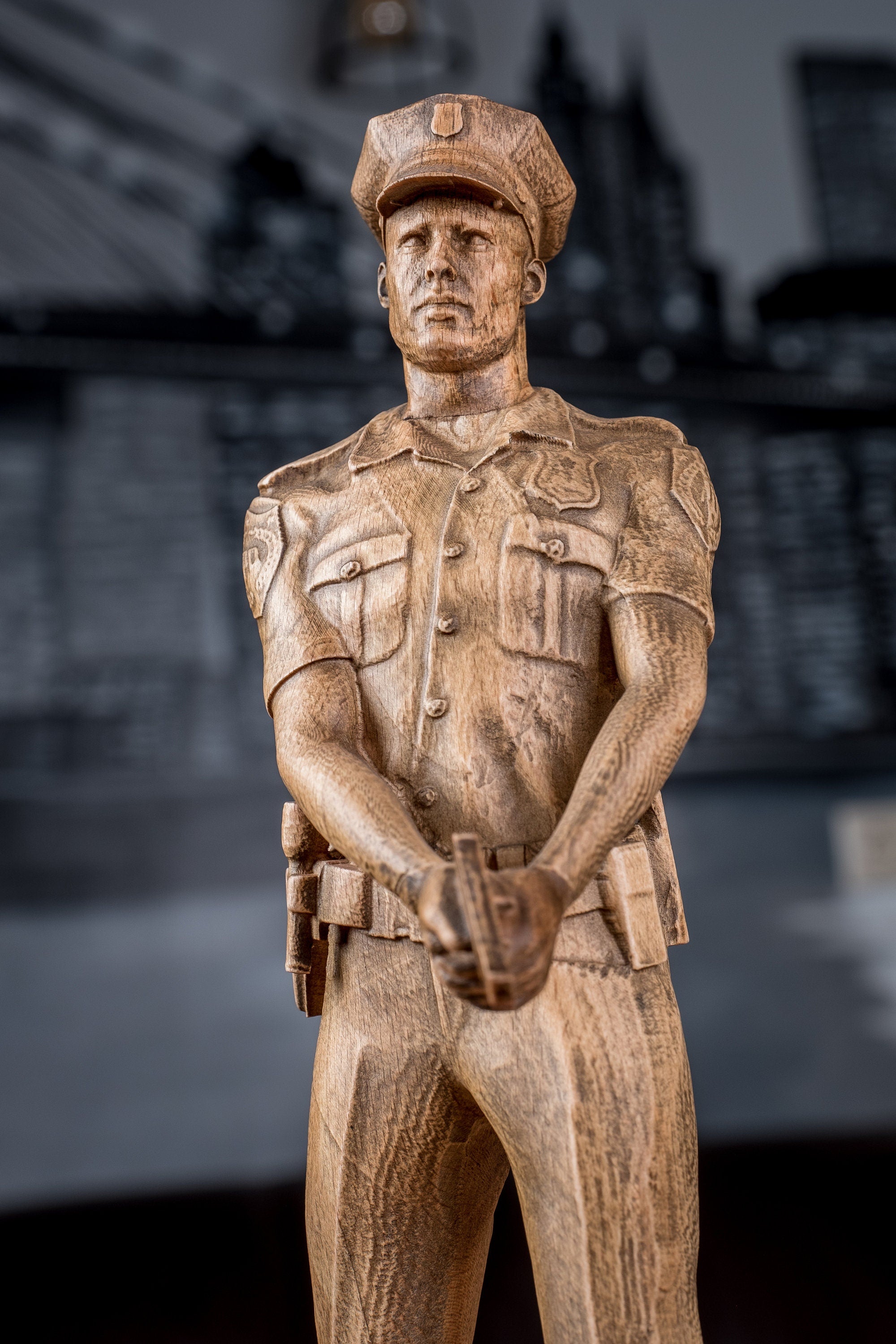 Policeman Figurine with Gun Wood Art Statuette